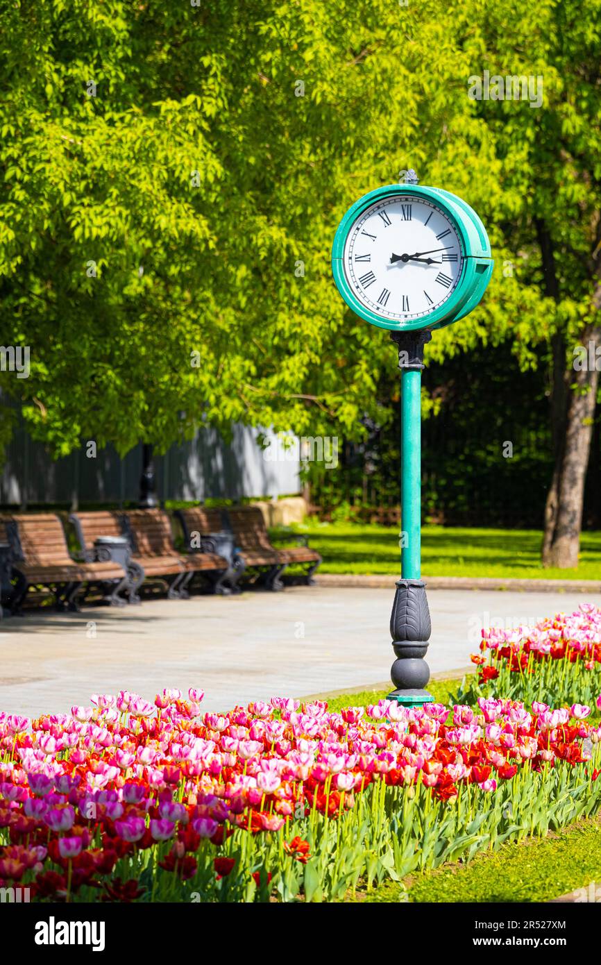 old clock with a big dial in a city park Stock Photo - Alamy