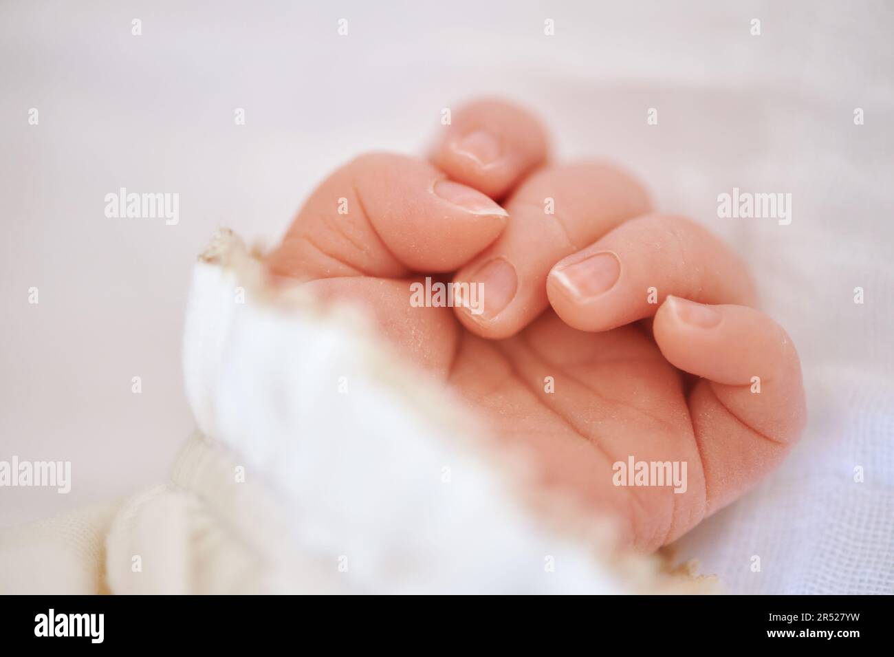 Close up image of newborn baby hand Stock Photo - Alamy
