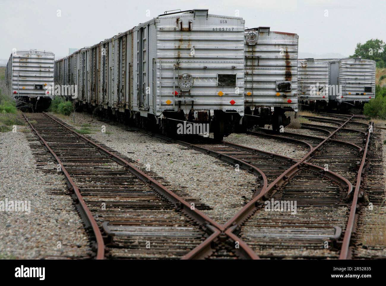concord20 103 pc.jpg A fleet of rusting train box cars used to ...