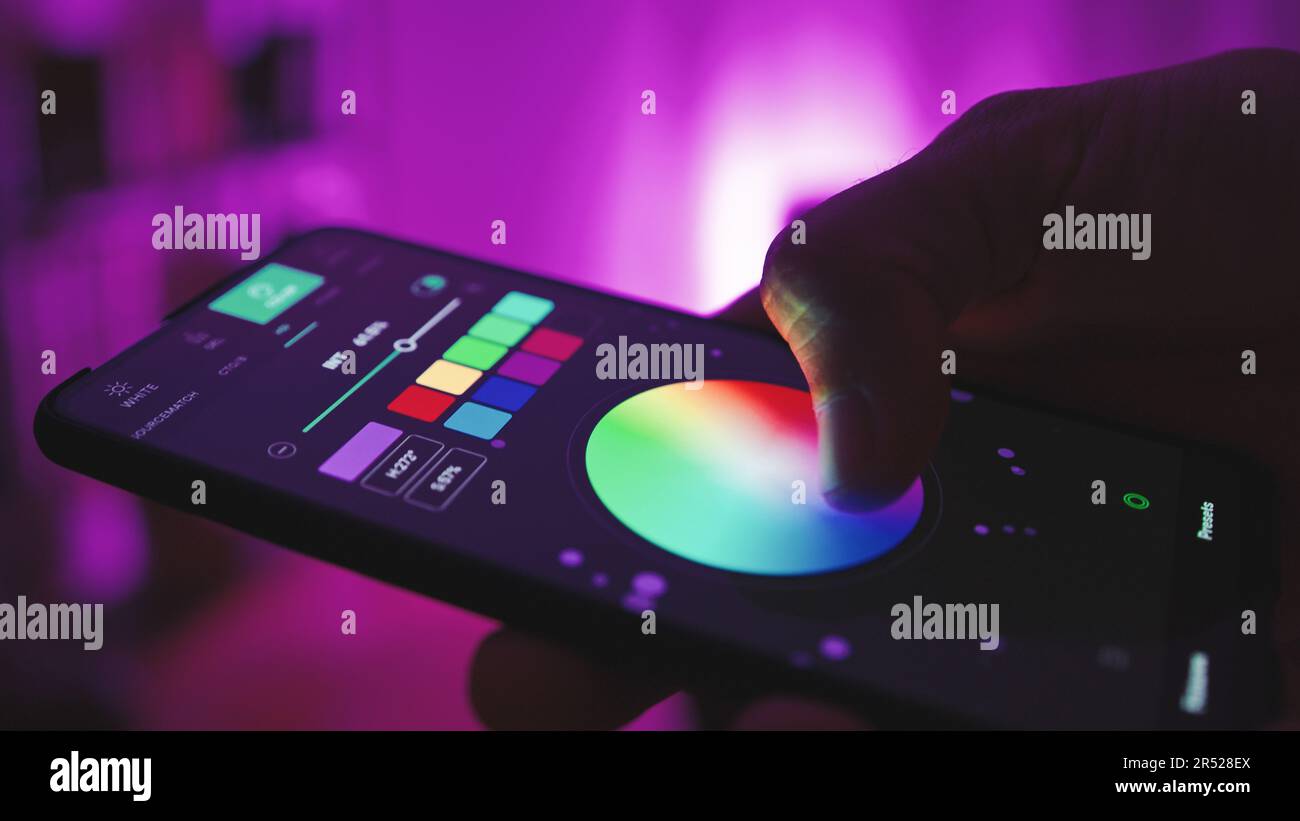 Changing the lights colors with phone Stock Photo - Alamy