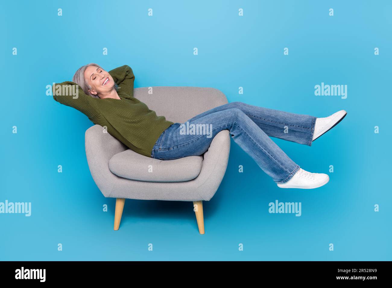 Full body photo of carefree sleeping woman satisfied lying armchair ...
