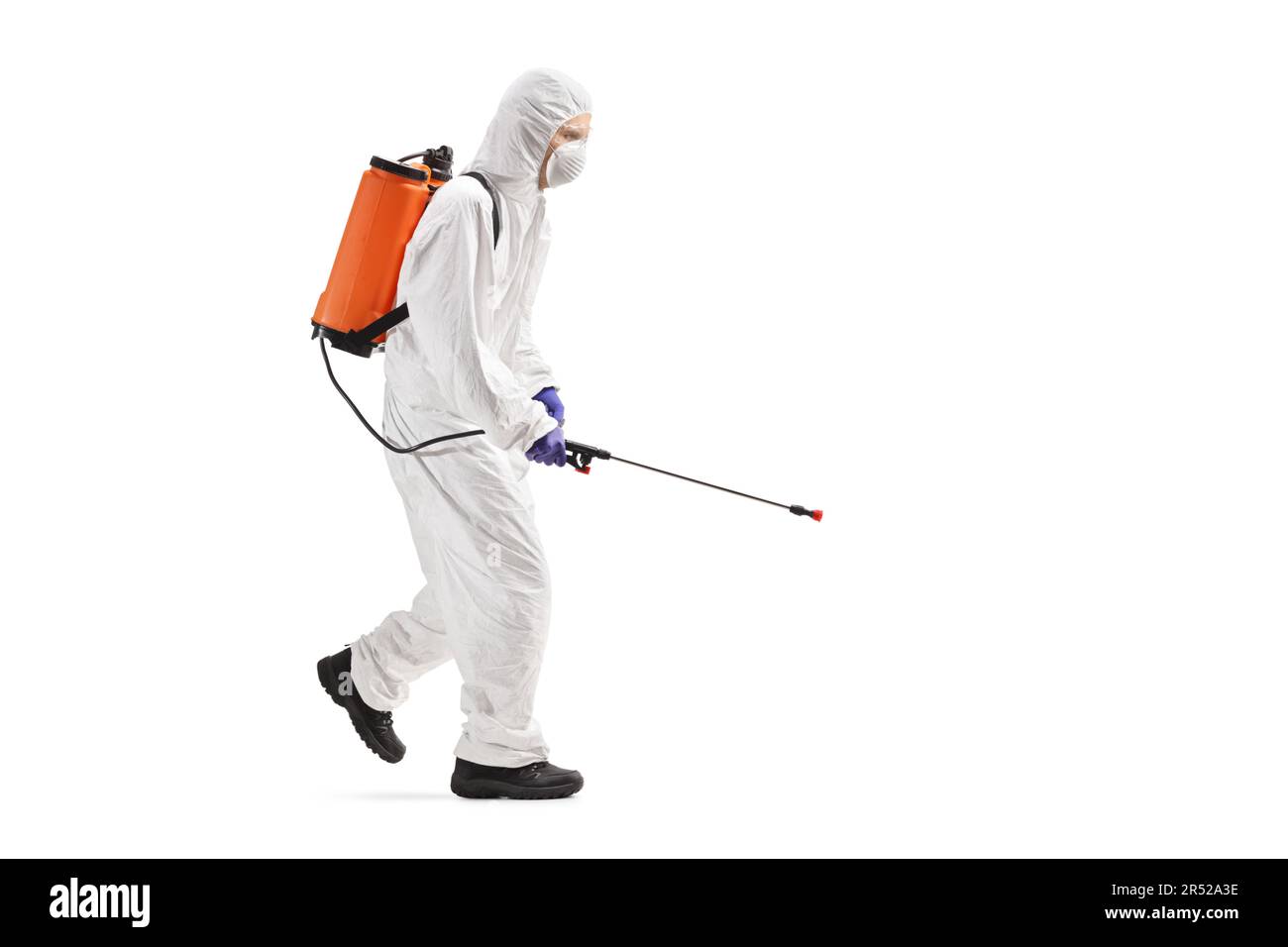 Full length profile shot of a professional worker in a hazmat suit ...