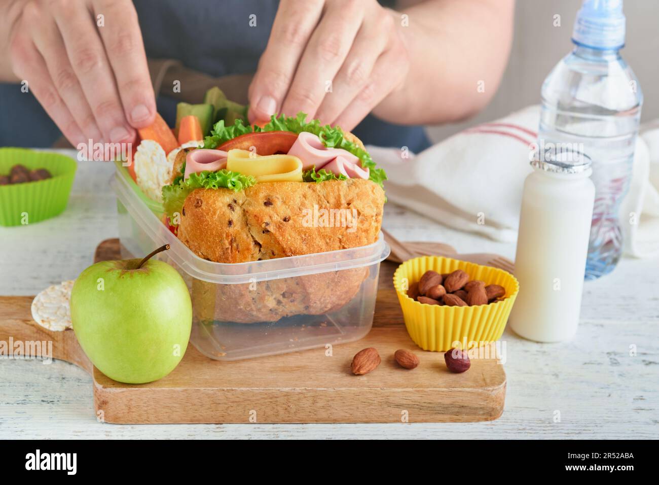 Healthy food for school lunch concept. Care father making school lunch ...