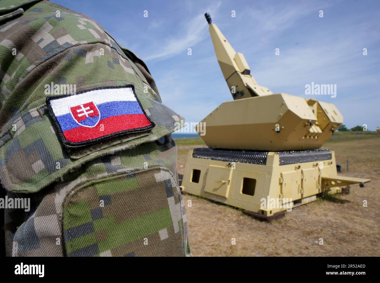 31 May 2023, Schleswig-Holstein, Todendorf: A Slovak soldier stands in ...