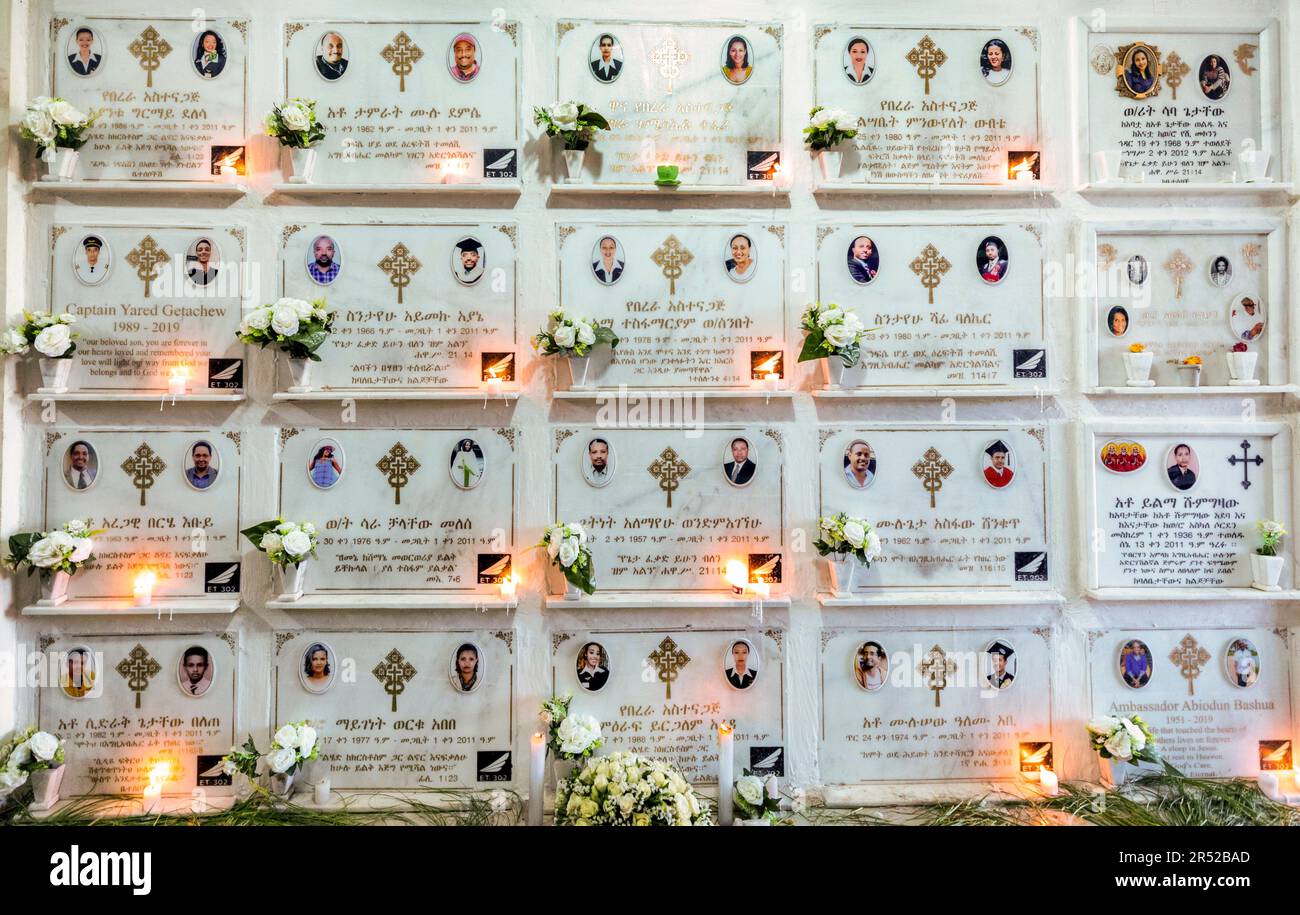 FILE - Candles are lit on a memorial wall during an anniversary ...