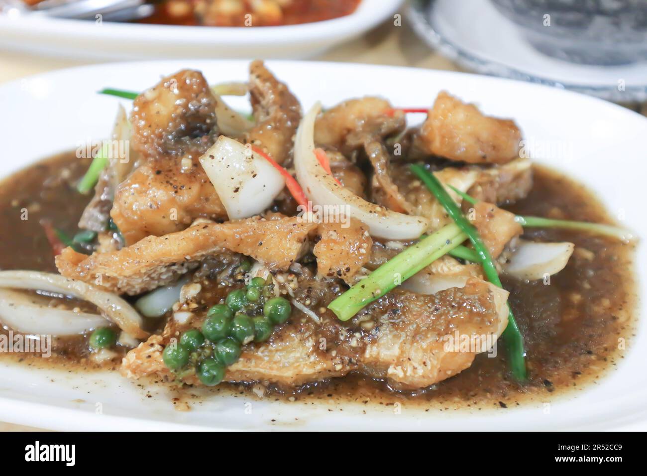 stir fried fish with vegetableor fried fish in gravy sauce Stock Photo ...
