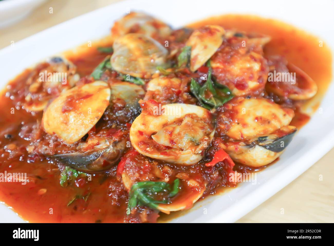 stir fried shell, shell salad or spicy shell in red curry Stock Photo ...
