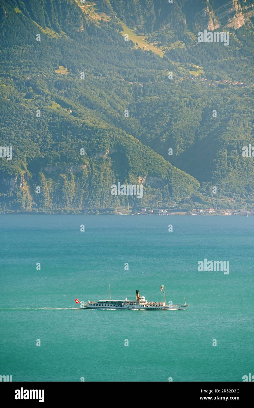 Steam boat with swiss flag floating on Lake Geneva or Lac Leman ...