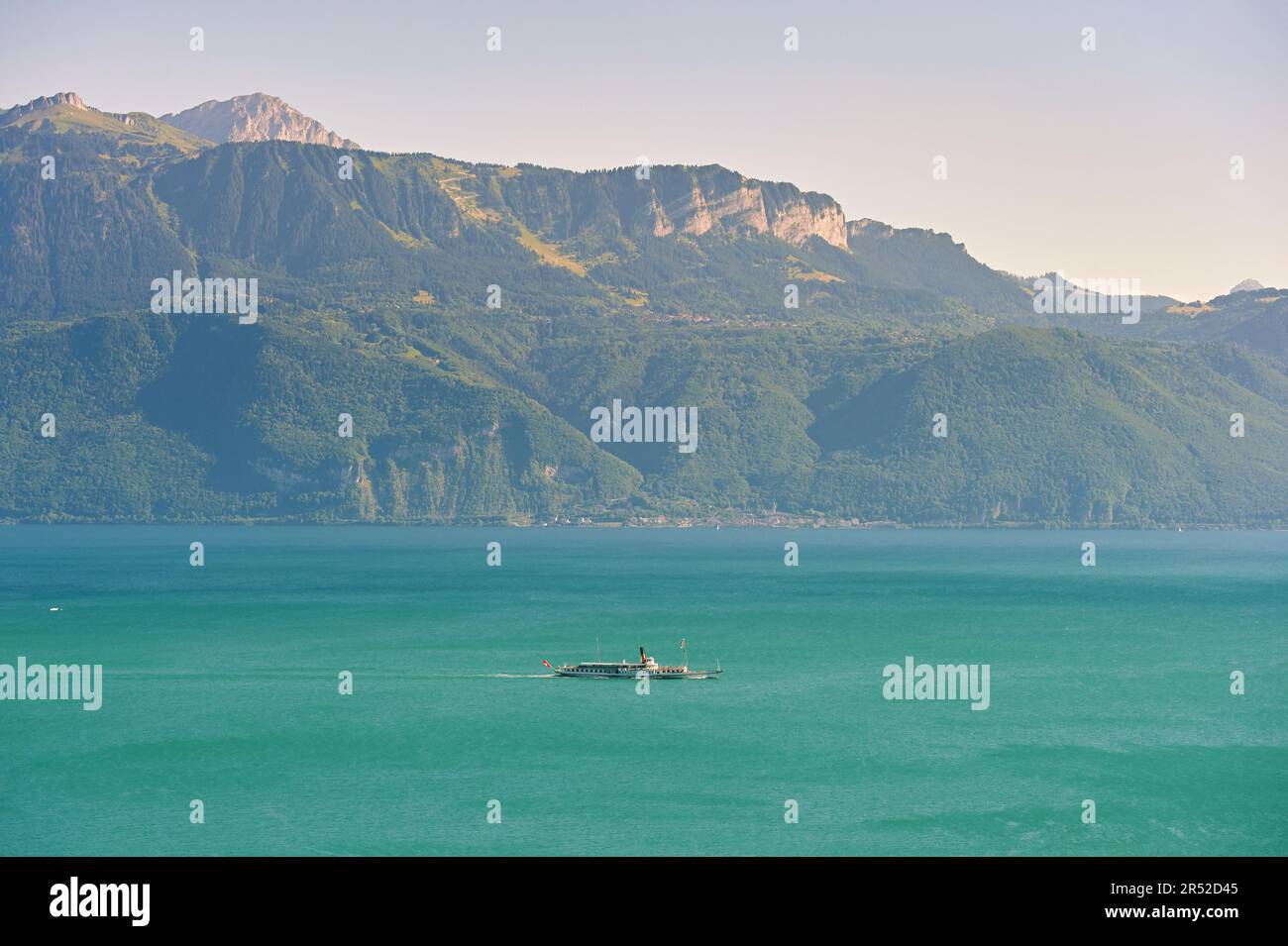 Steam boat with swiss flag floating on Lake Geneva or Lac Leman ...