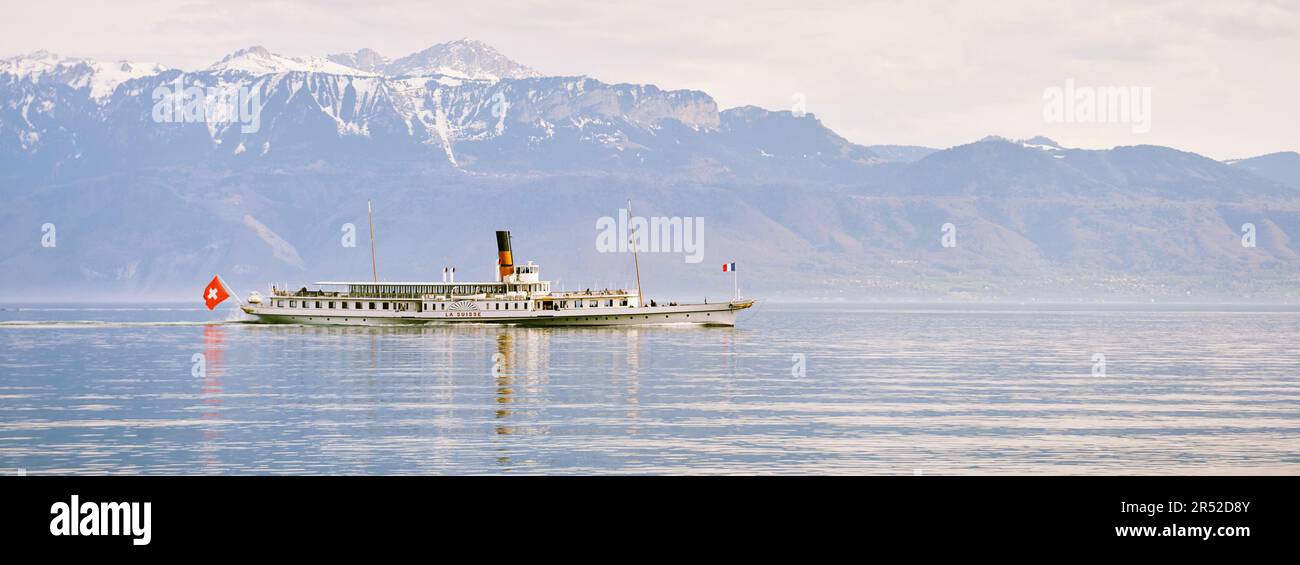Panoramic banner with steam boat with swiss and french flags floating ...