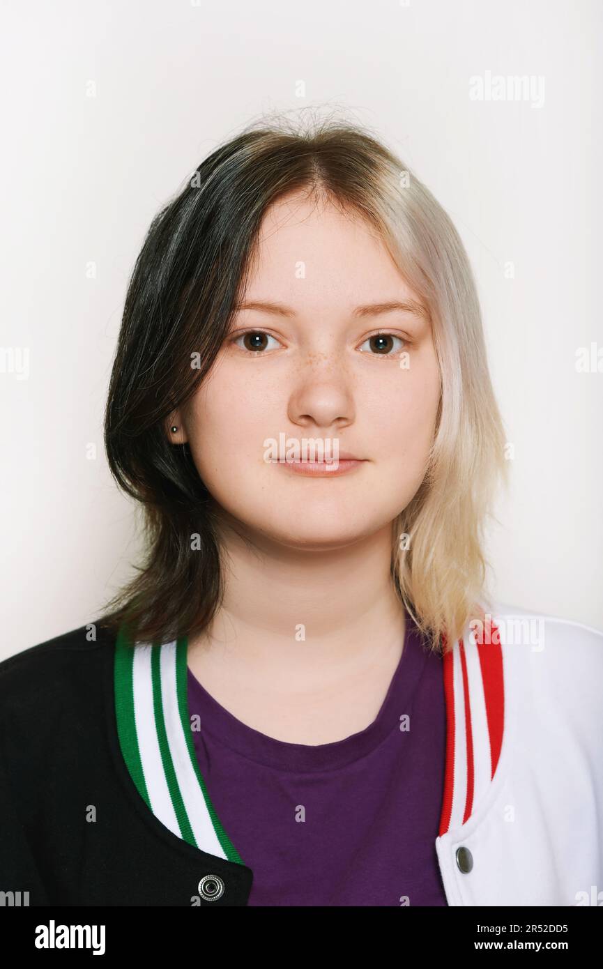 Close up portrait of young teenage girl with split hair Stock Photo - Alamy