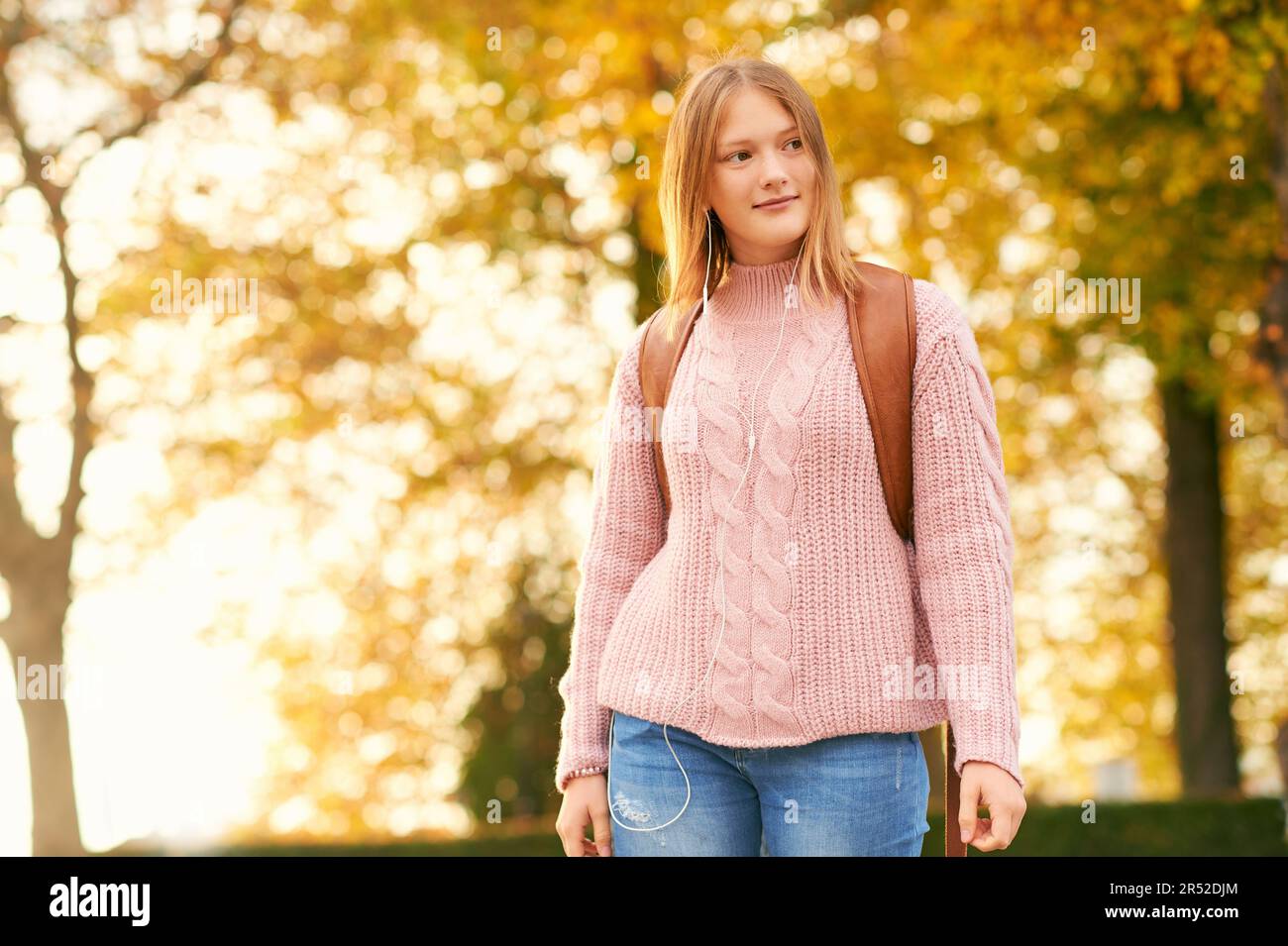 Outdoor portrait of young teenage girl with backpack, education and ...