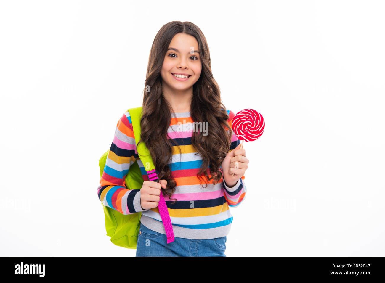 Teen girl hold lollipop caramel on white background, candy shop ...