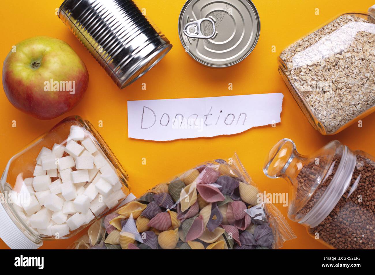 Food donation on yellow hi-res stock photography and images - Alamy