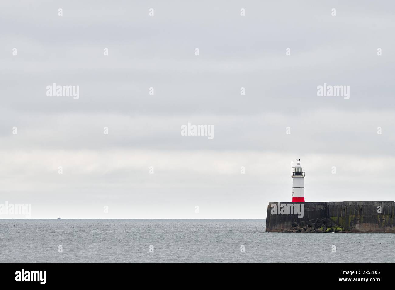 Lighthouse at the entrance from the English Channel to the harbour on ...