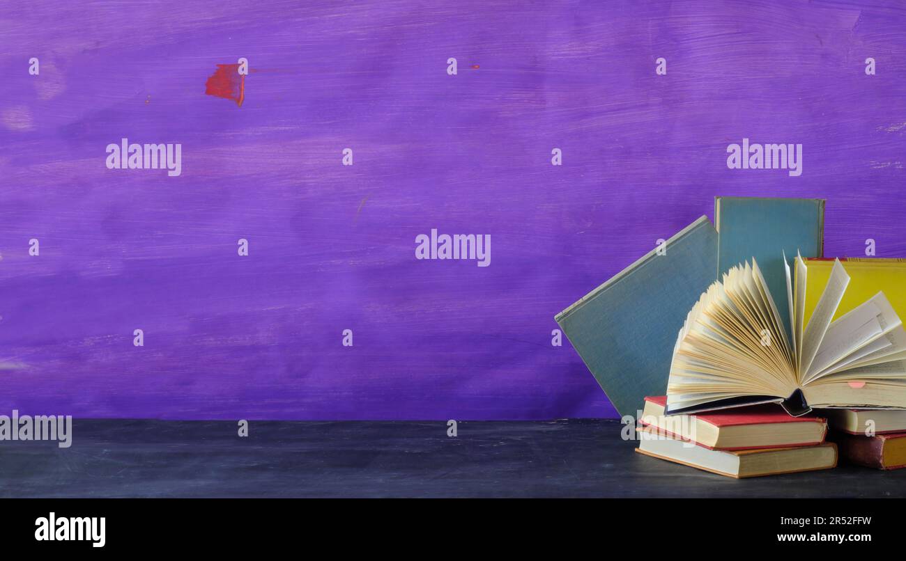 open book with stacks of books, education, knowledge, learning, reading ...