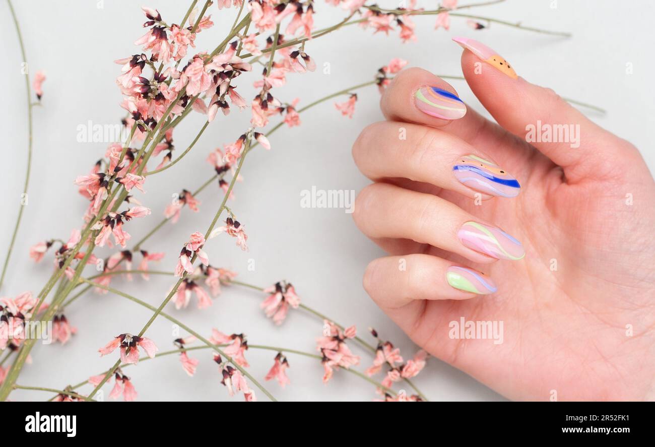 Beautiful female hands with manicure Stock Photo - Alamy
