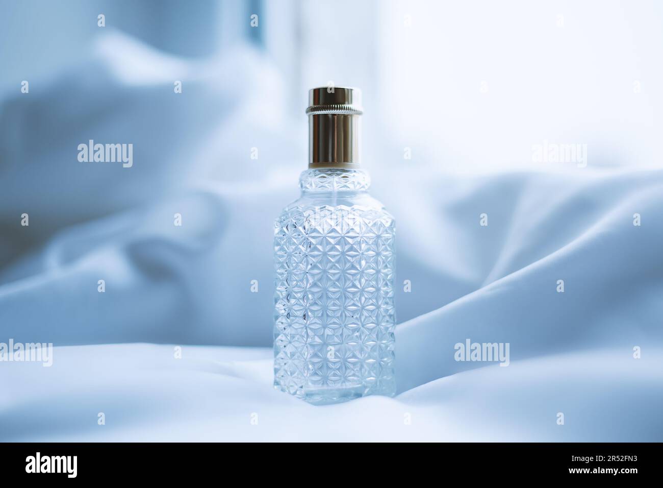 Stylish bottle of perfume Stock Photo - Alamy
