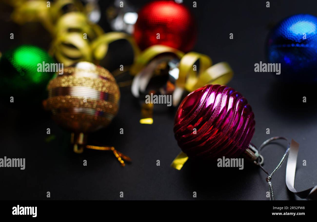 Beautiful Christmas balls on black background Stock Photo - Alamy
