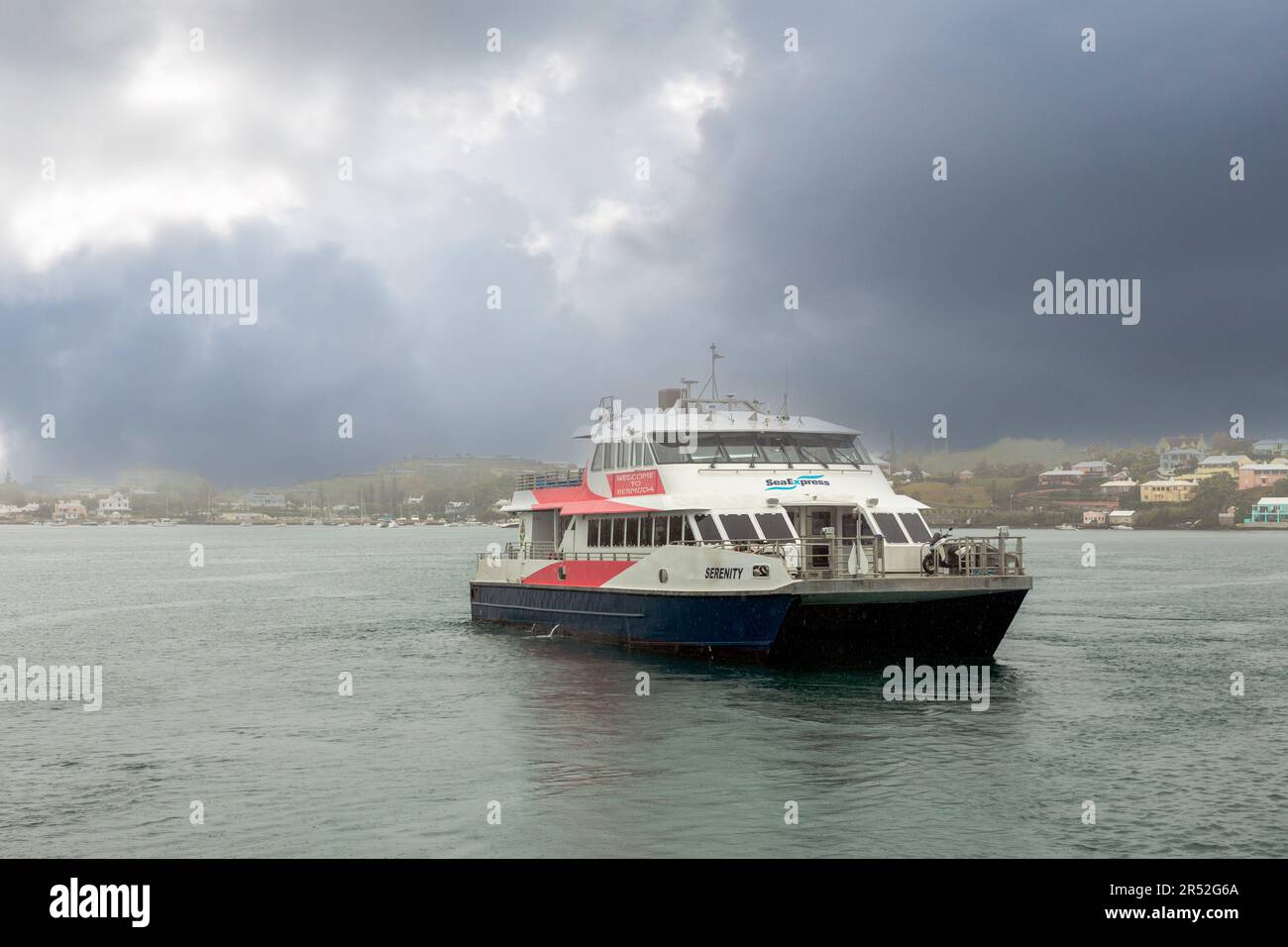 A commuter ferry leaves the Ferry Terminal in the rain off Front Street ...