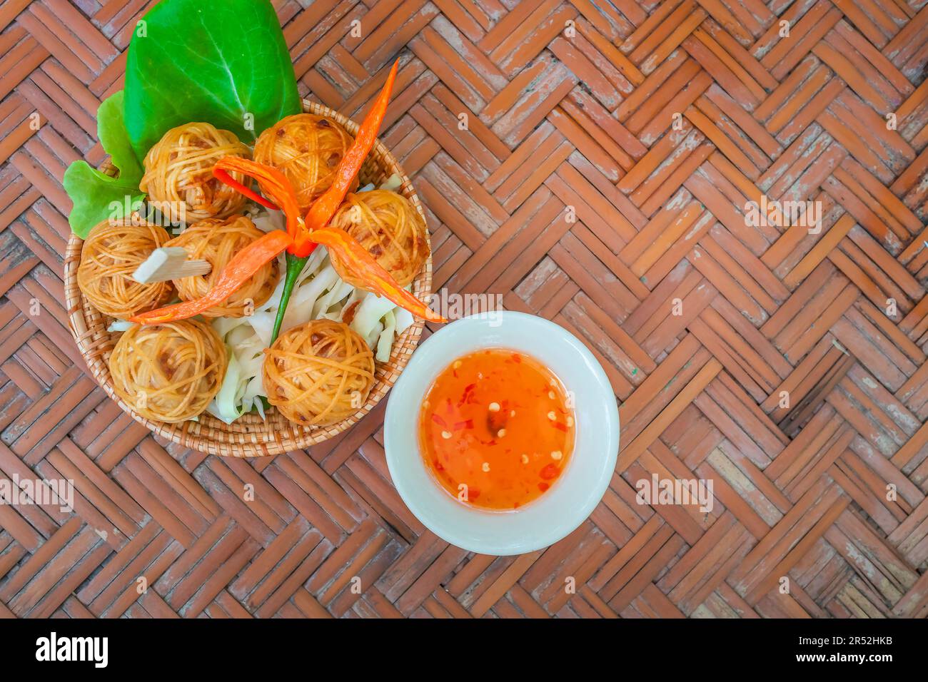 Deep fried wrapped pork with noodle. Traditional thai food as known as ...