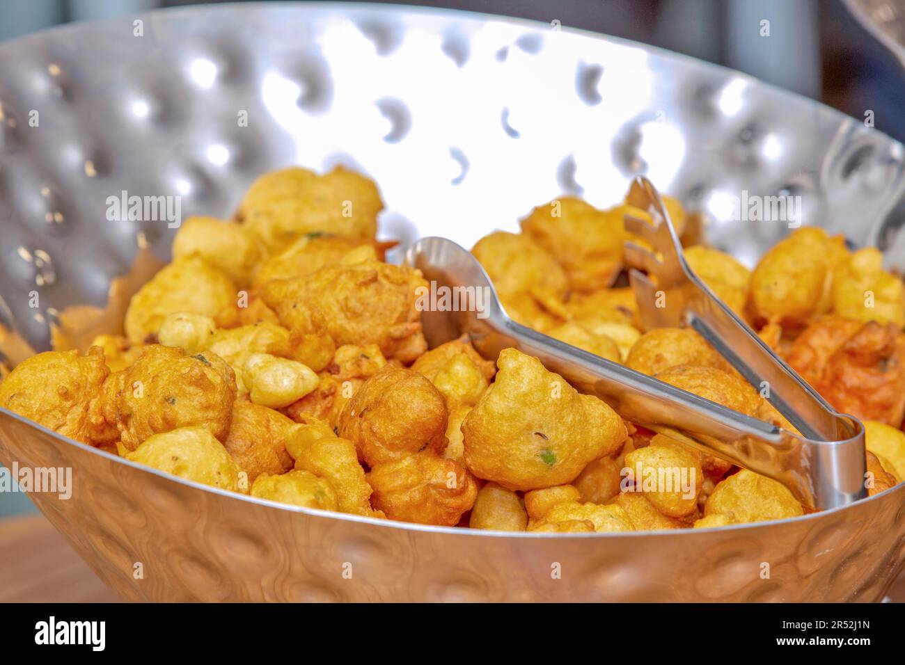 Pakora is a dish consisting of pieces of vegetable or meat that are ...