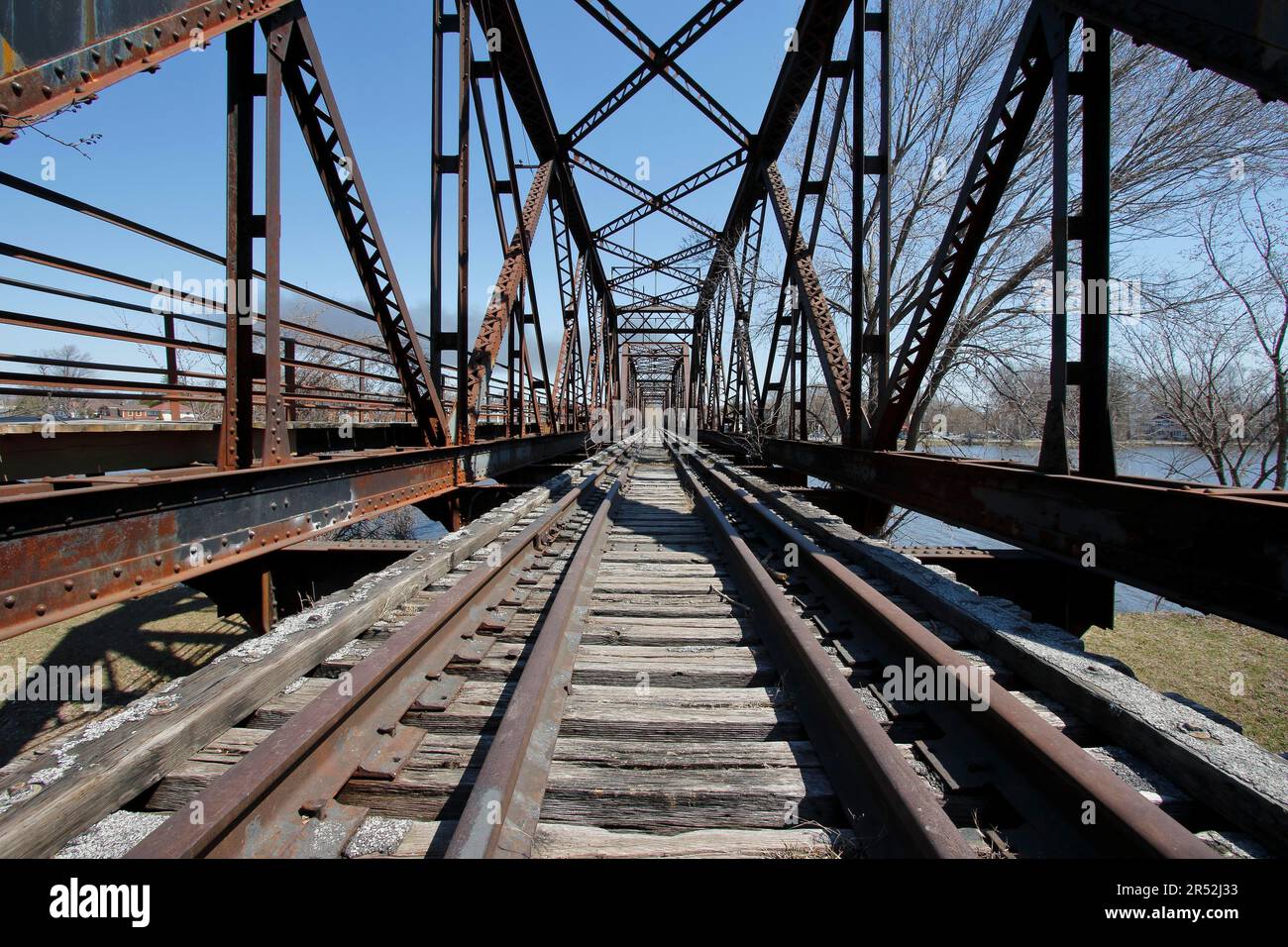 Old railway bridge over river, Province of Quebec, Canada Stock Photo ...