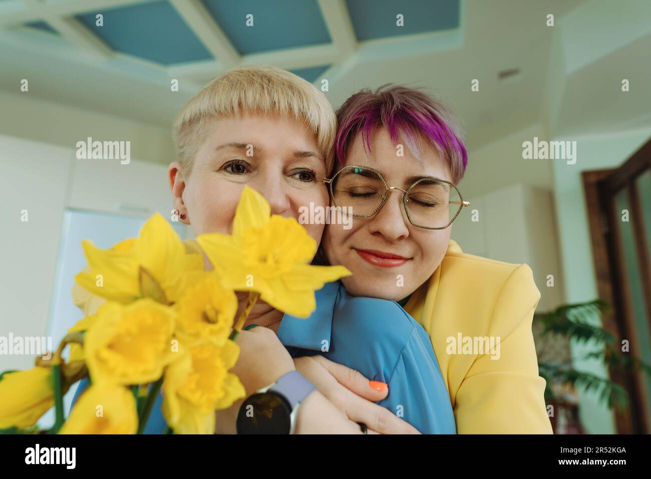 Heartwarming Embrace Non Binary Daughter Surprises 55 Year Old Mom