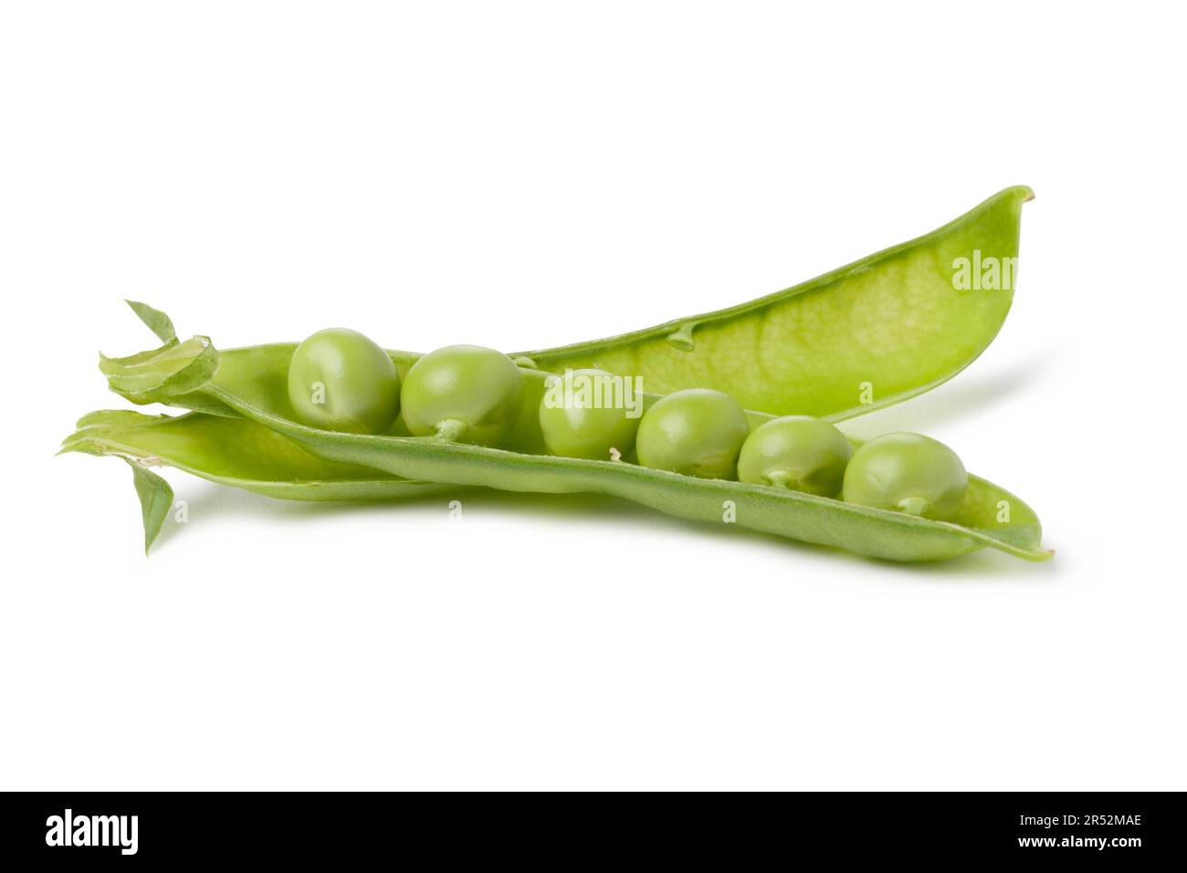 pod of peas on white background Stock Photo - Alamy