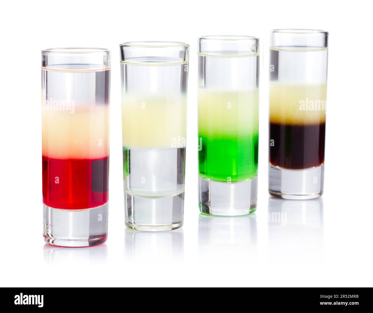 Four shot drink cocktails isolated on white background Stock Photo - Alamy