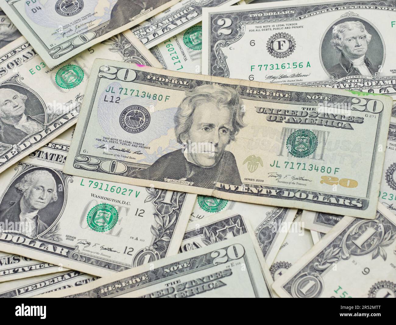 Numerous Twenty, One and Two Dollar Bills Laying Flat on a Table - Odd ...