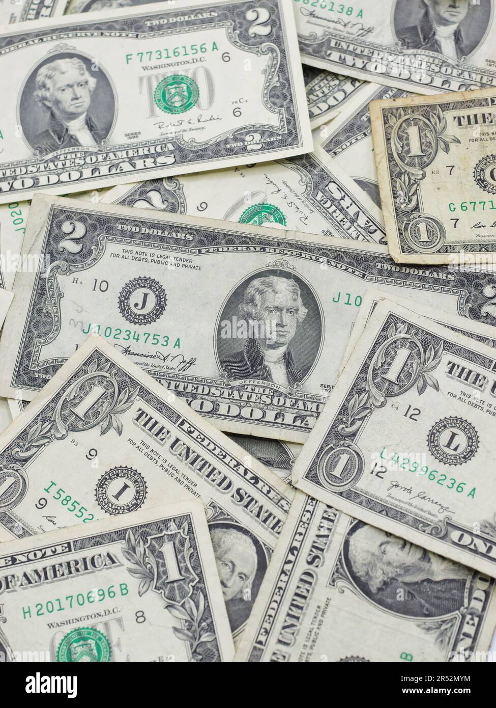 Numerous One and Two Dollar Bills Laying Flat on a Table - Odd Unique ...