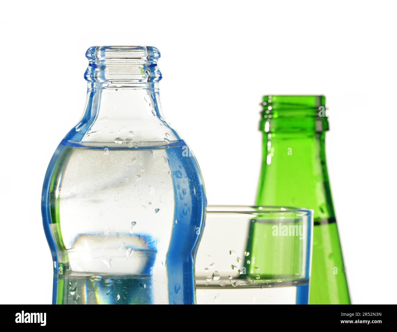 Glass bottle of mineral water isolated on white Stock Photo - Alamy