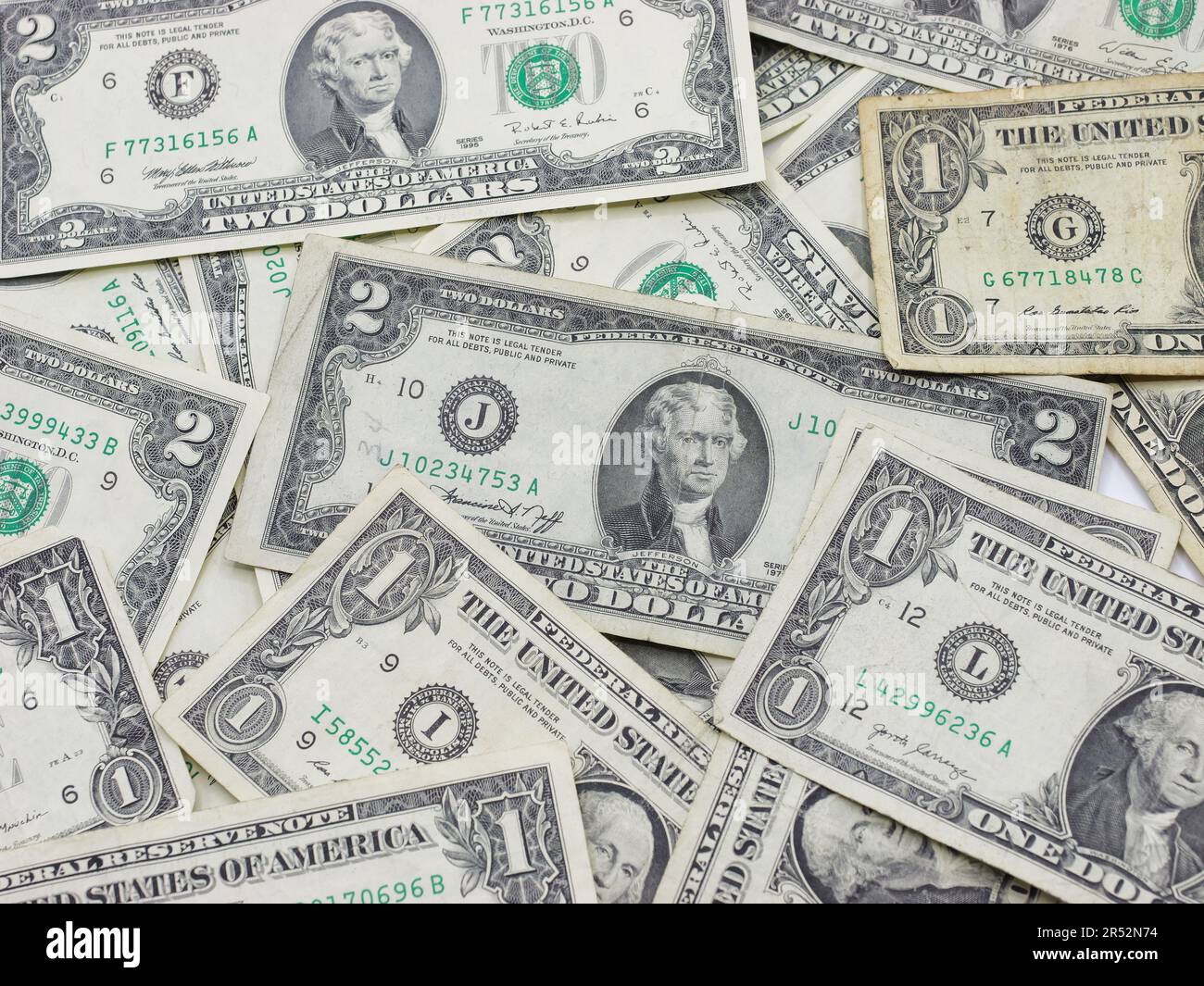 Numerous One and Two Dollar Bills Laying Flat on a Table - Odd Unique ...