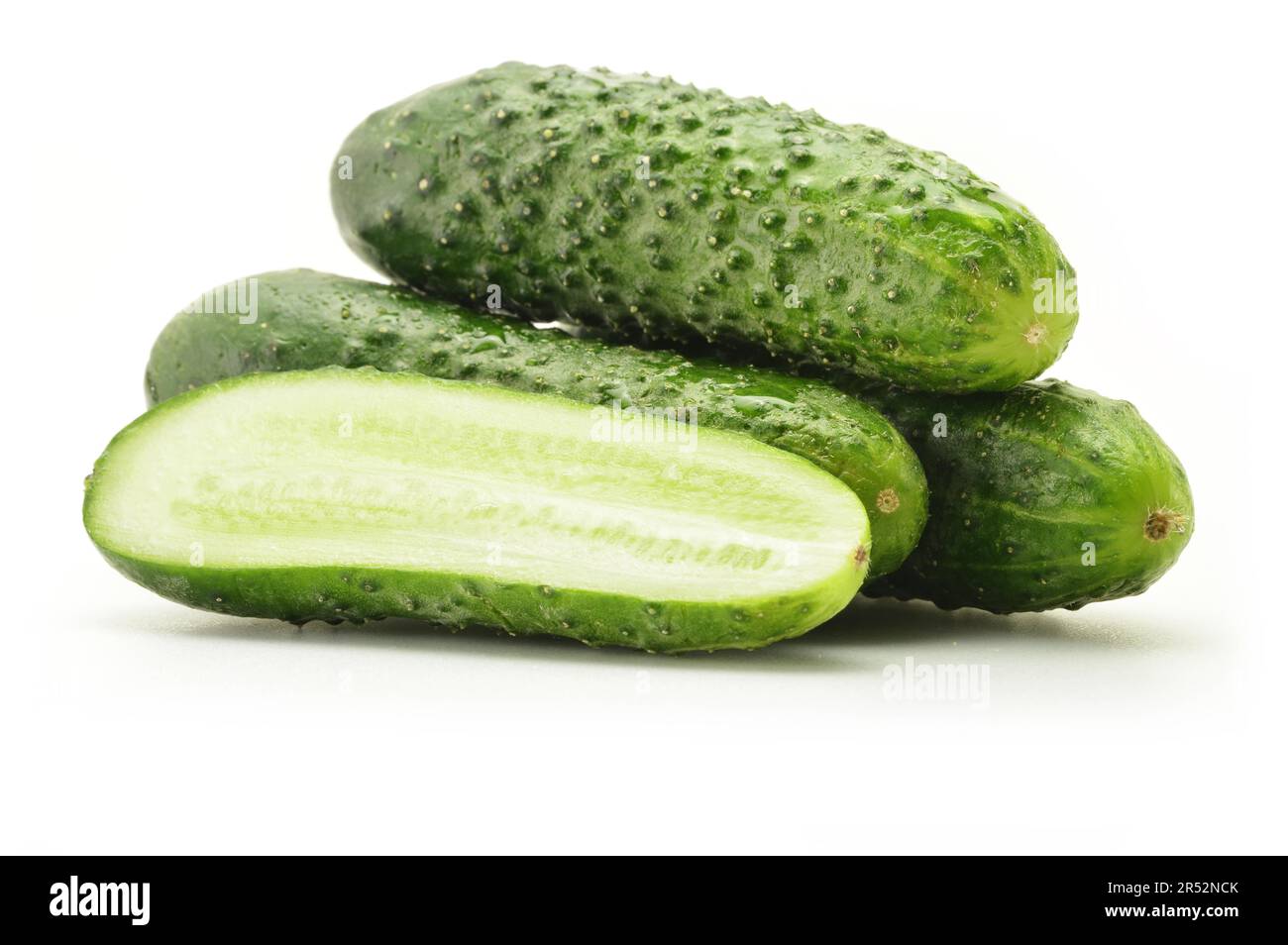 Fresh raw cucumbers isolated on white Stock Photo - Alamy