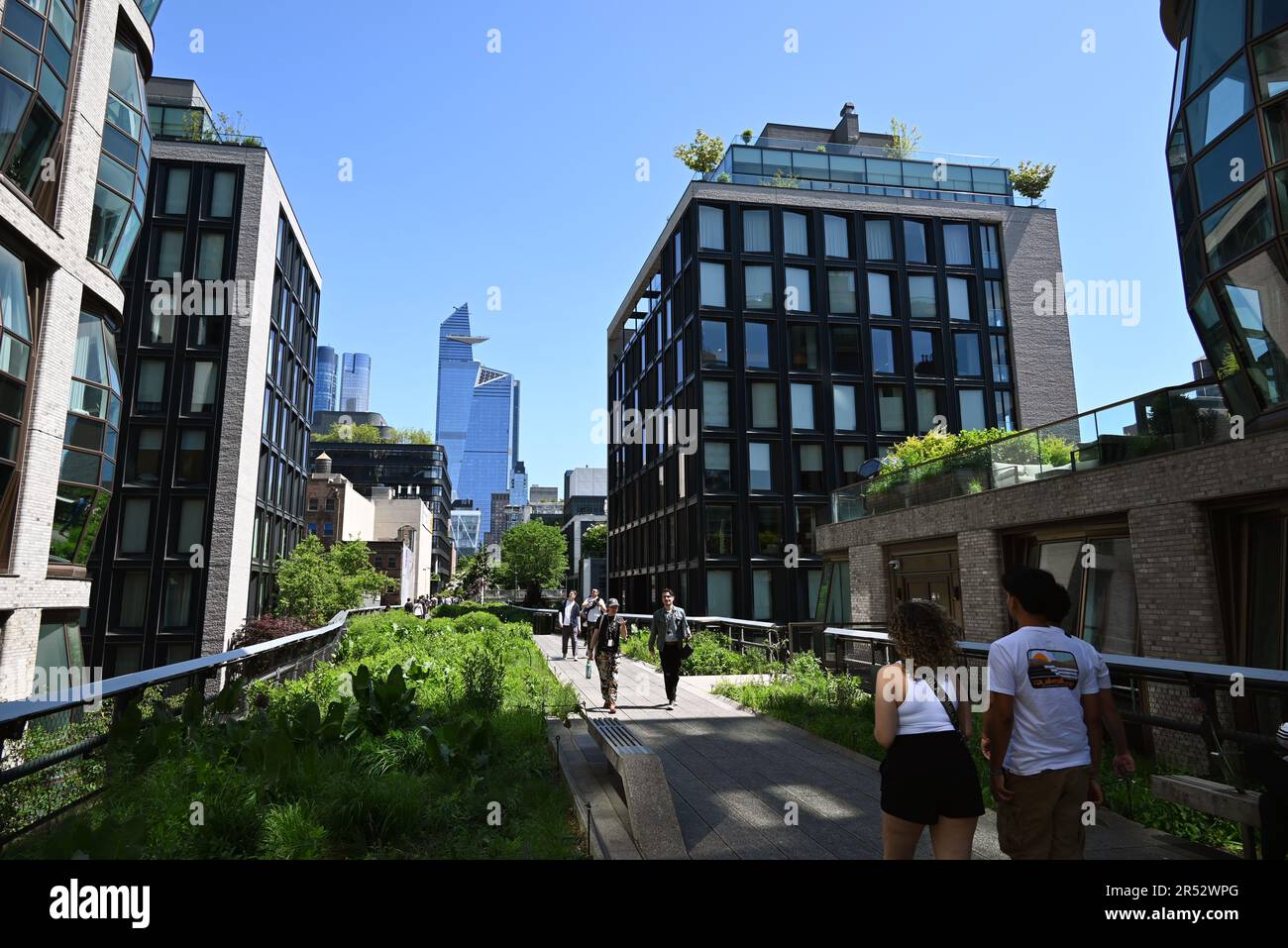 The High Line Park follows an old elevated rail line and and provides a ...