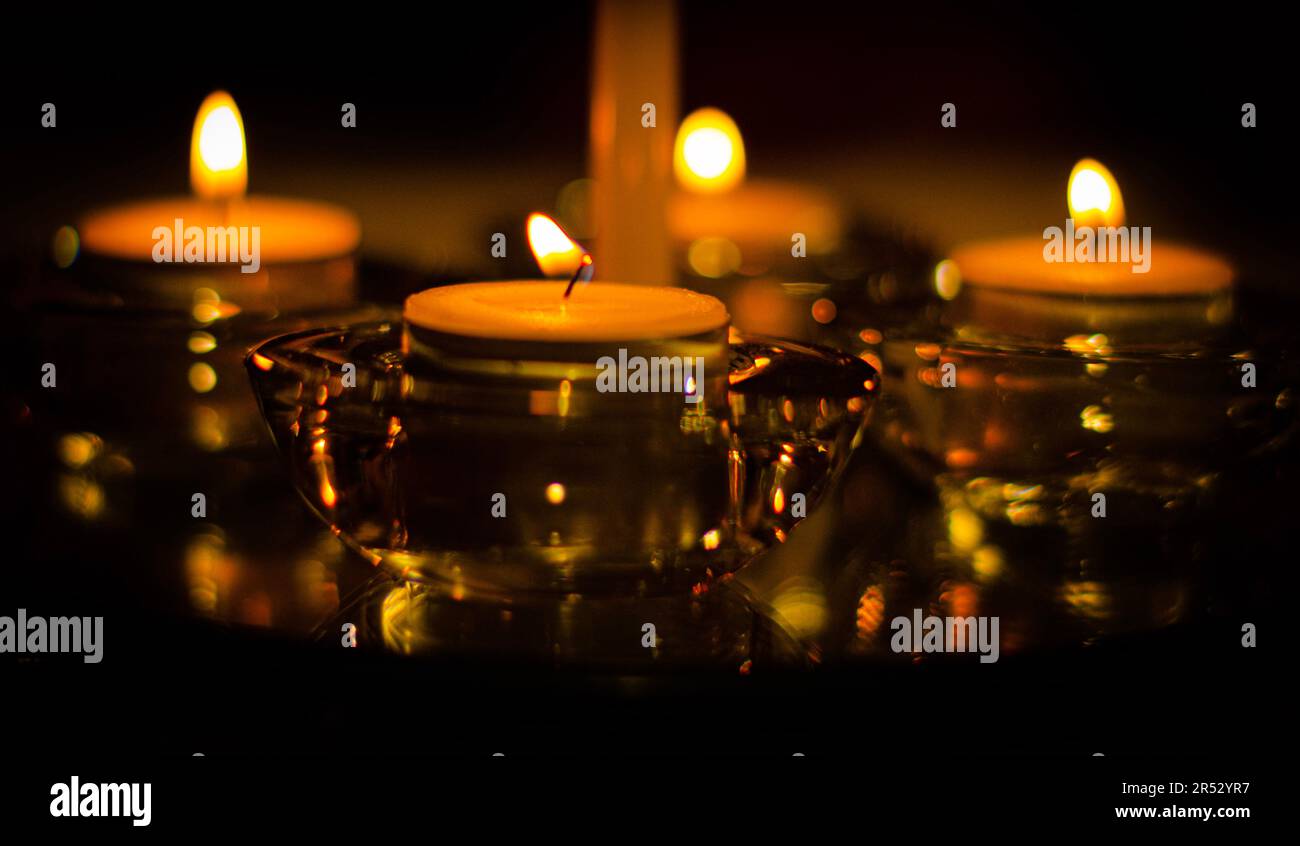Four candles in church hi-res stock photography and images - Alamy