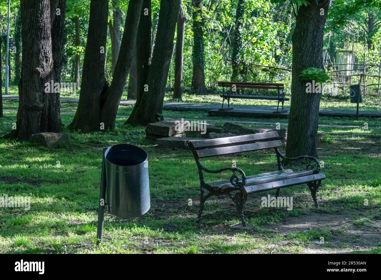 Two benches in the park Stock Photo - Alamy