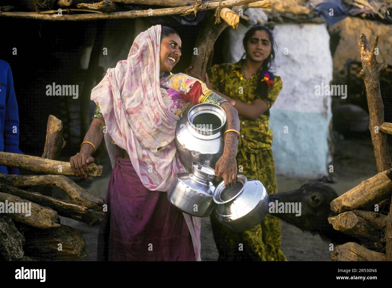 Woman fetch water hi-res stock photography and images - Alamy