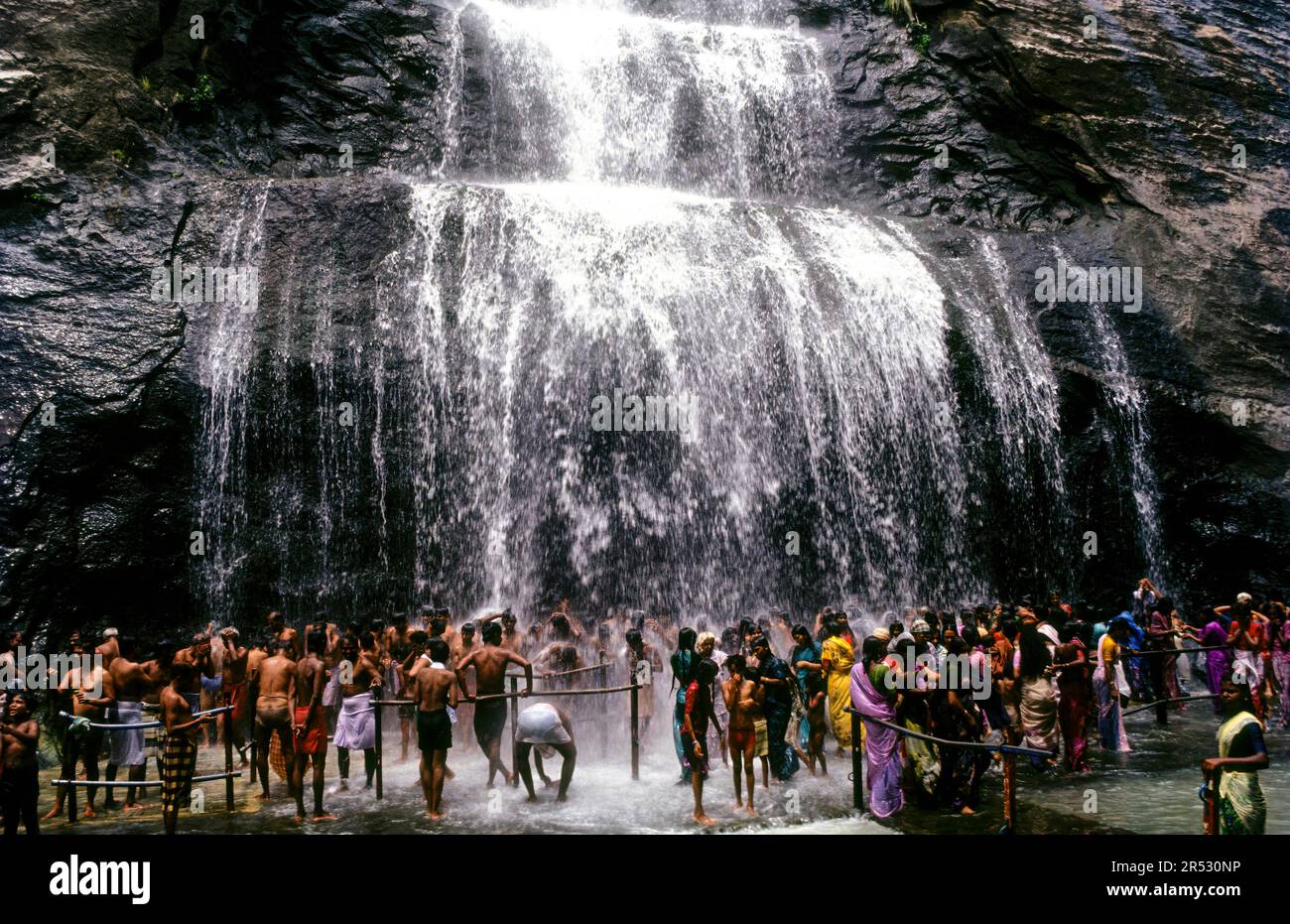 People bathing Pazhaya Courtalla Aruvi Old Courtallam falls, the Spa of ...
