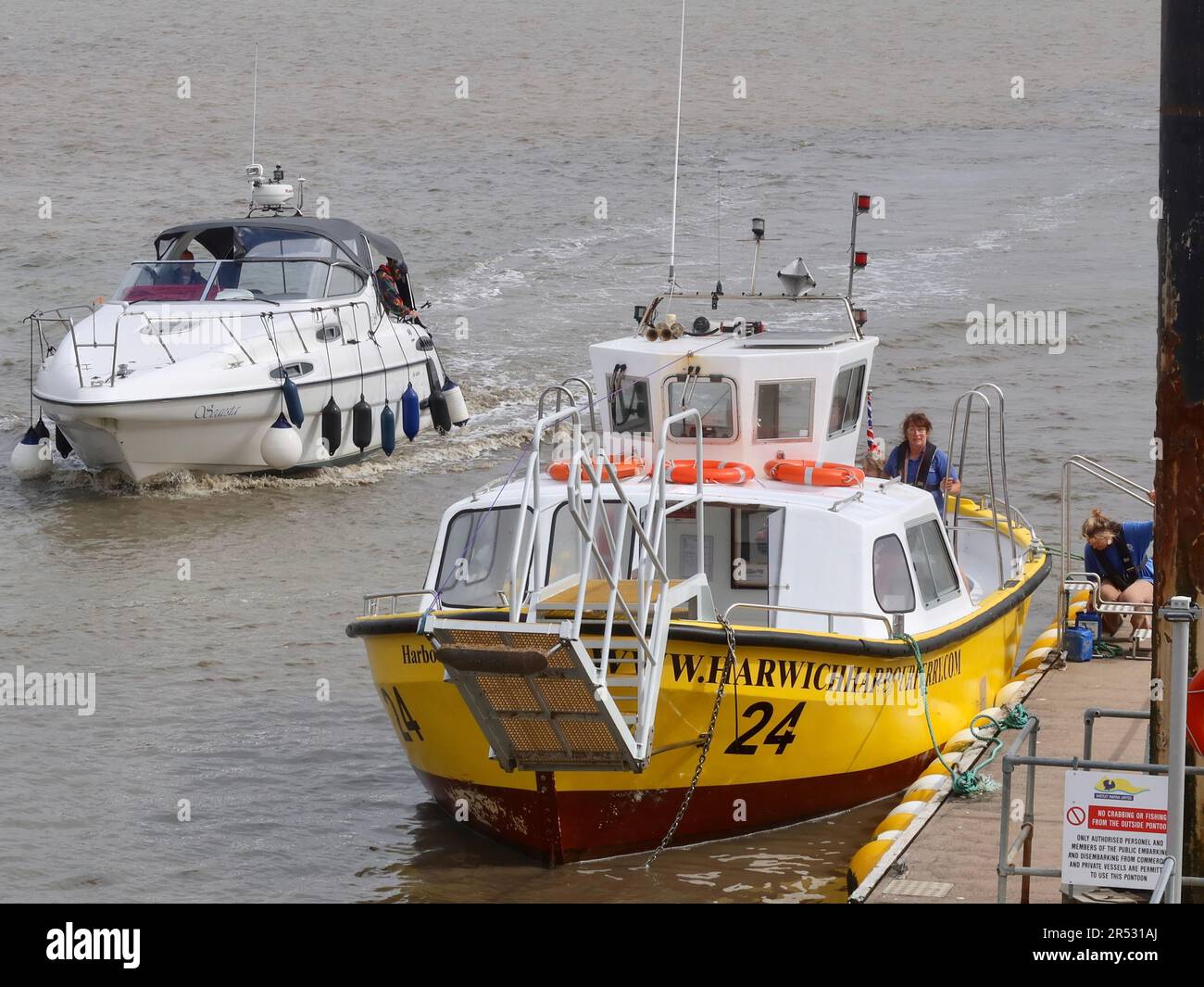 Harwich Harbour, Essex - 31 May 2023 : The bright yellow harbour foot ...