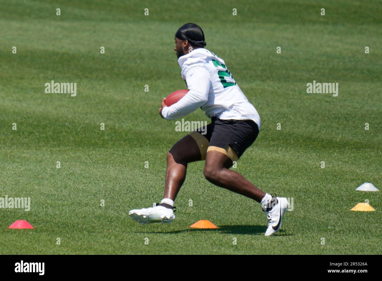 New York Jets' Breece Hall participates in a drill at the NFL football ...