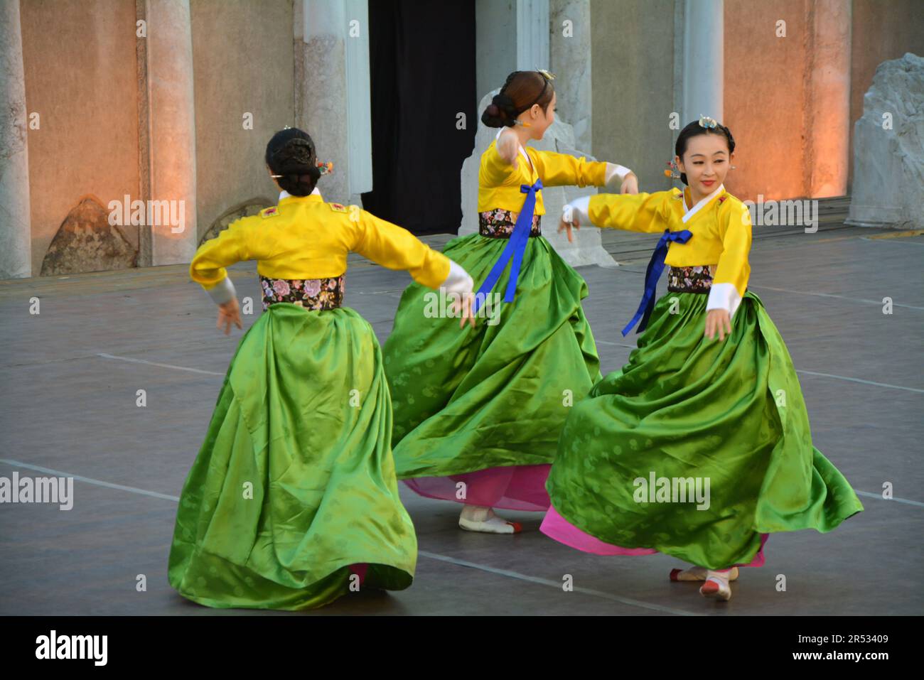 Beautiful women from the Republic of Korea in colorful costumes perform ...