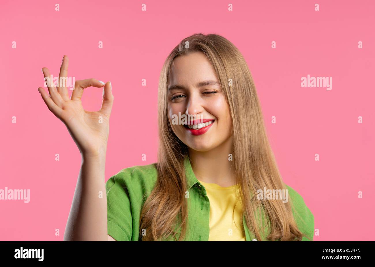 Pretty woman with OKAY sign, ok gesture. Happy lady, correct choice on ...