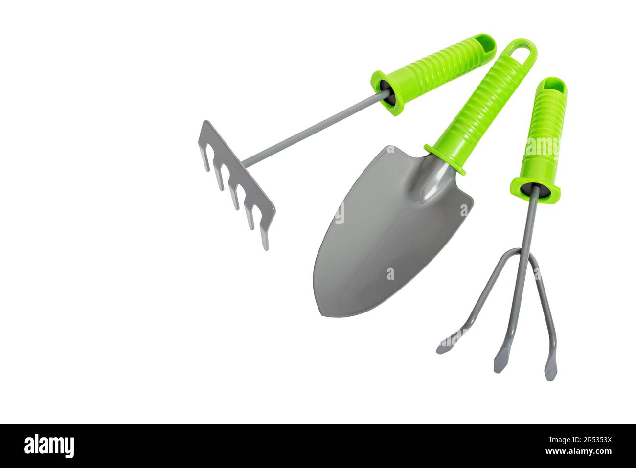 Garden shovel, rake and fork isolated on white background. Garden tools ...