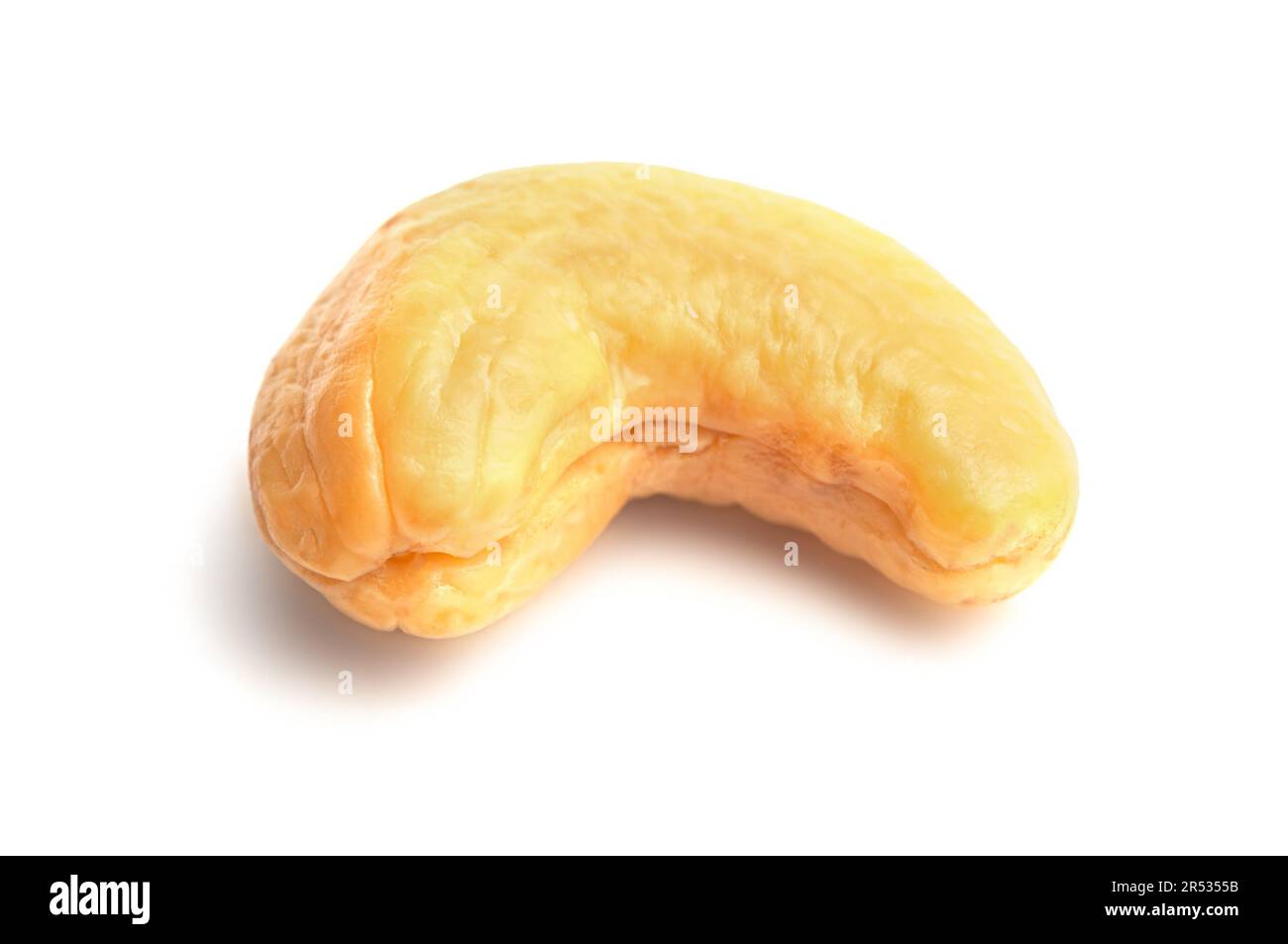 Close up of Roasted cashew nut isolated on white background. Macro ...