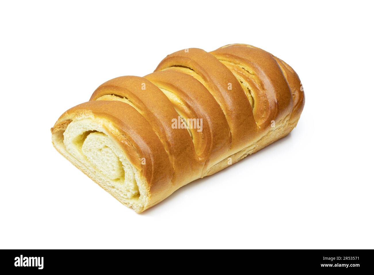 Sliced dessert pastry roll filled with vanilla cream isolated on white ...