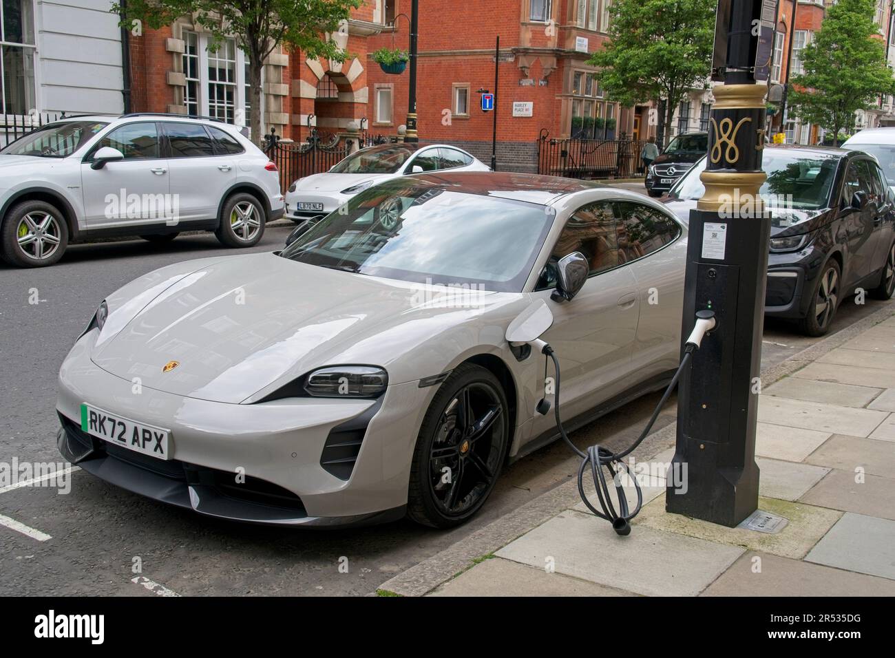 Harley Street London England UK Electric powered motor car charging up ...