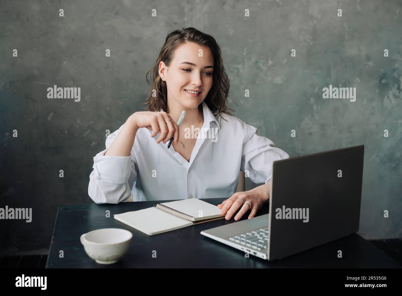 Digital Teaching: Elegant Businesswoman or Teacher Engaging in Video Conference from Office ...