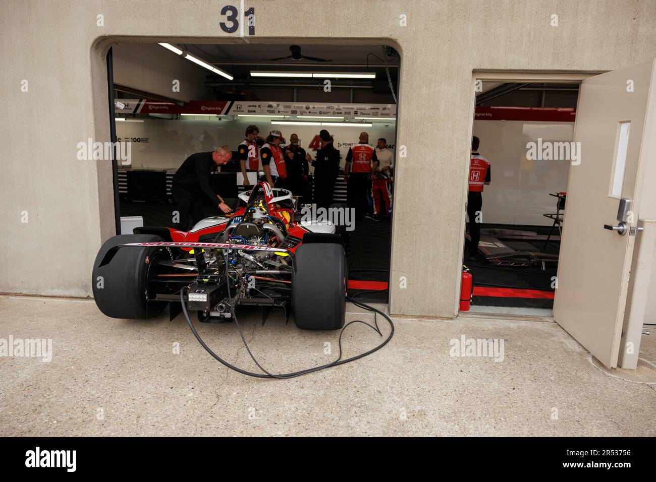 INDIANAPOLIS, INDIANA, UNITED STATES - 2023/05/28: Crew members work on ...